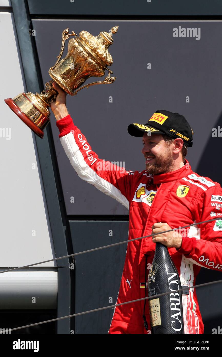 Race winner Sebastian Vettel (GER) Ferrari celebrates on the podium. 08 ...