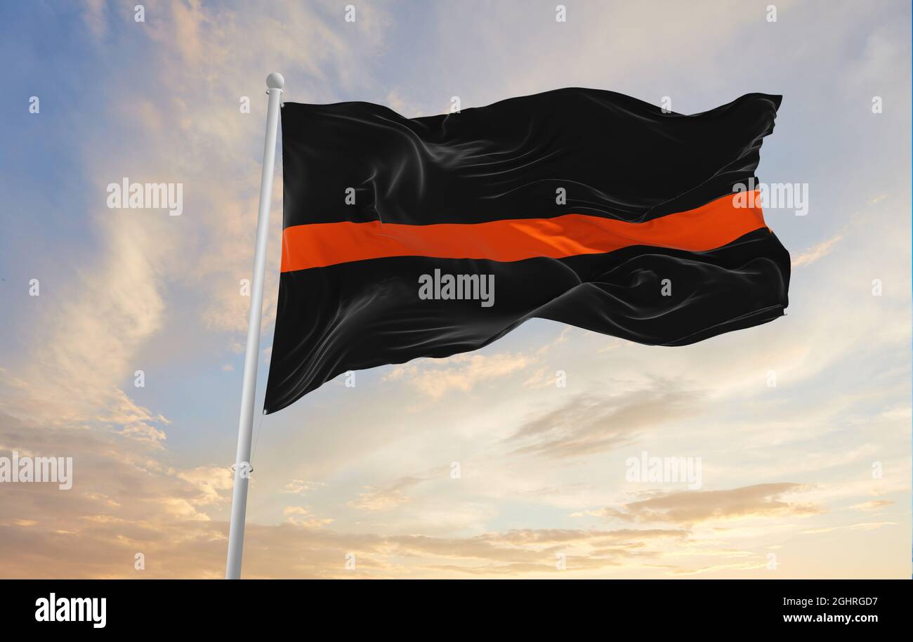 Thin Orange Line flag waving at sky background on sunset, panoramic ...