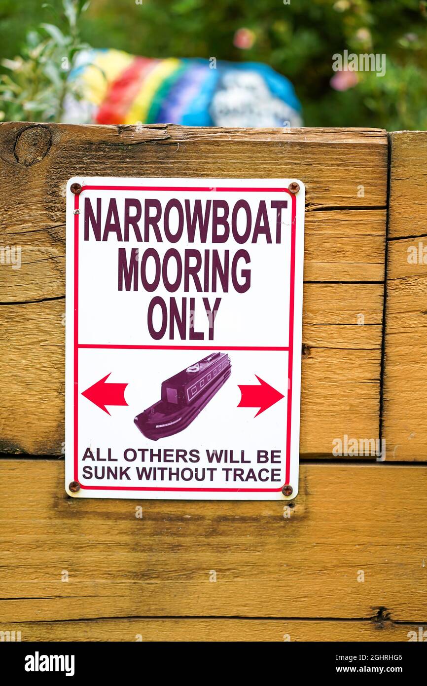 'Narrowboat Mooring Only' sign on garden fence of residential property ...