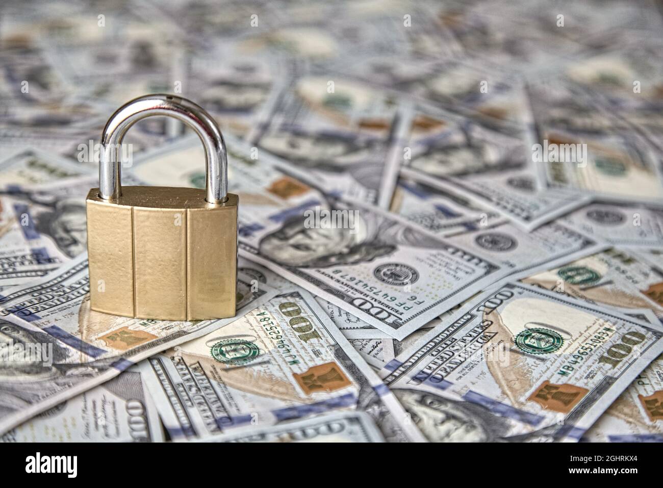 Financial security. padlock on the background of money The concept of ...