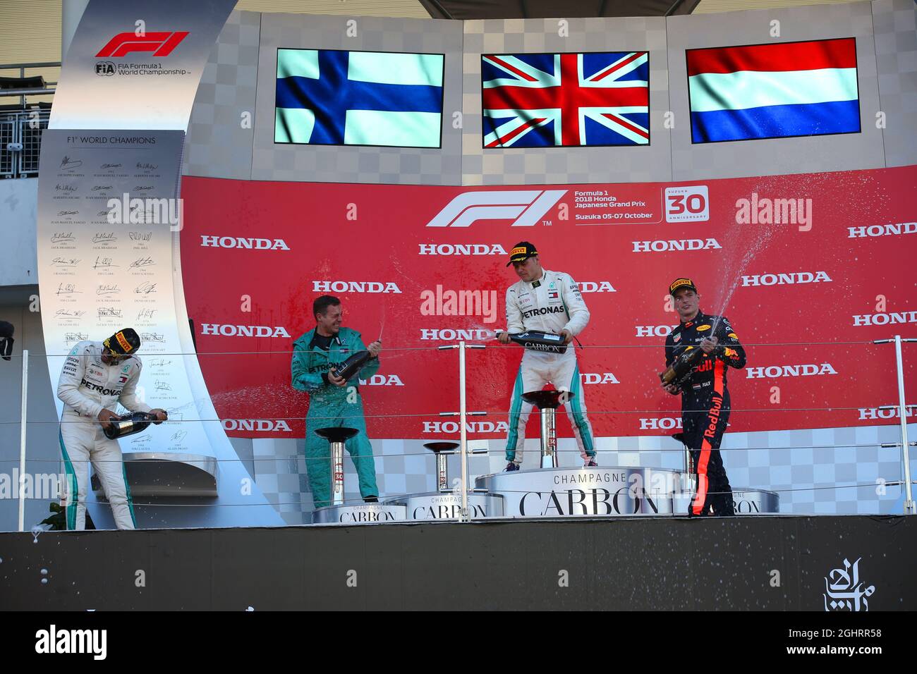The podium (L to R): Lewis Hamilton (GBR) Mercedes AMG F1, race winner ...