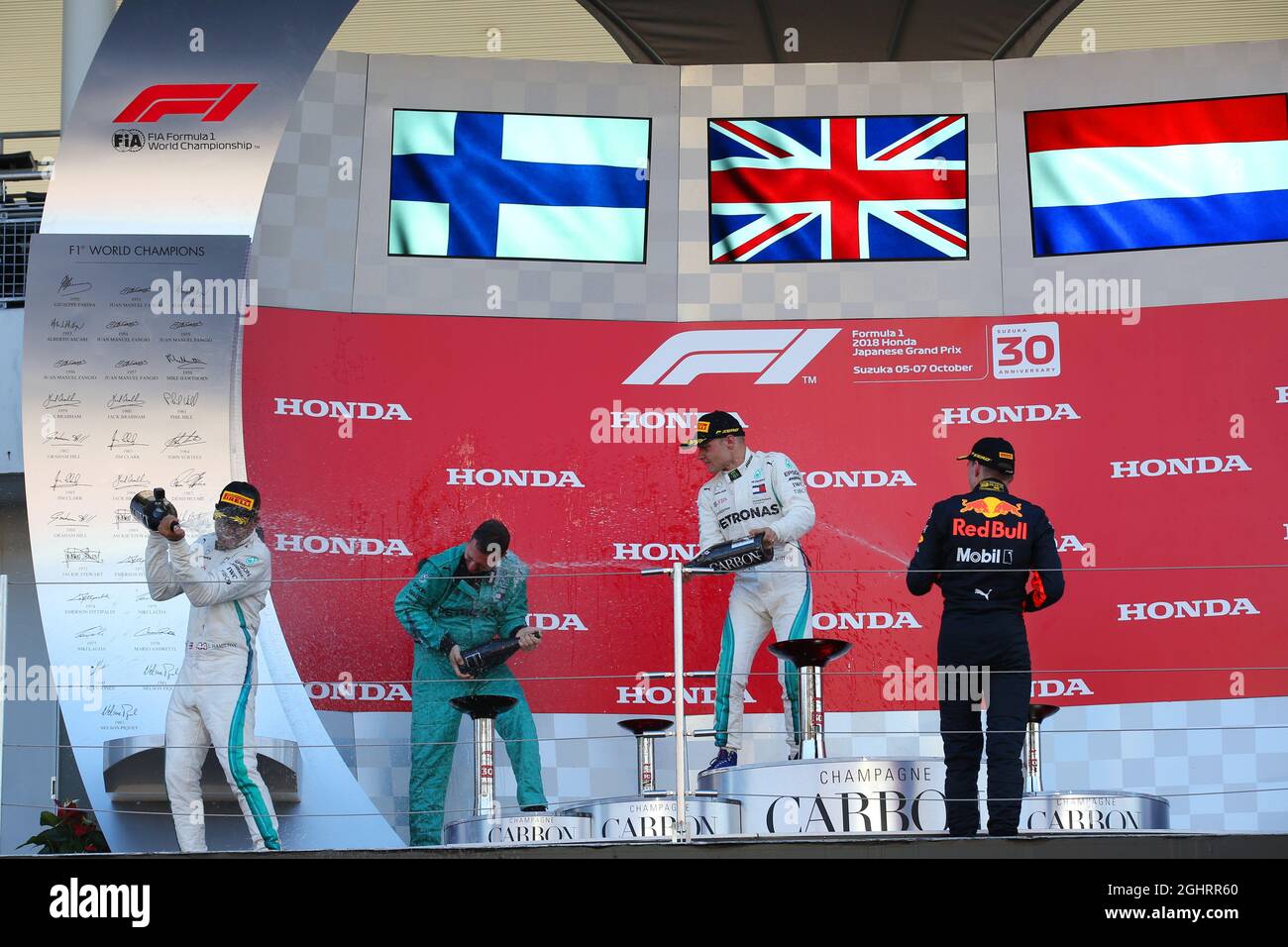 The podium (L to R): Lewis Hamilton (GBR) Mercedes AMG F1, race winner ...