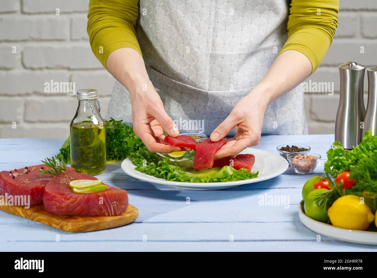 Fresh raw tuna fish was cut into pieces. Cooking Tuna fish Stock Photo ...