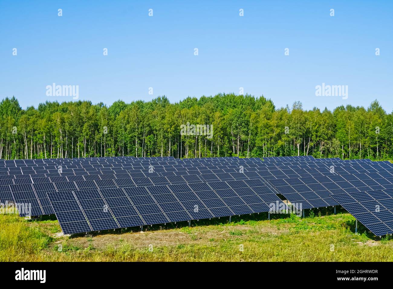 Solar power plant in summer day. Photovoltaic panels for renewable ...