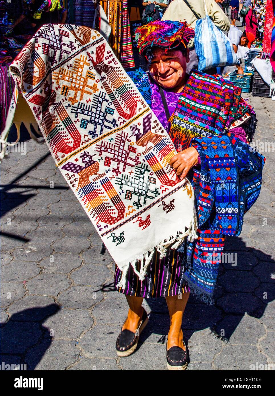 Cloth vendor, most important market in the highlands, Chichicastenango ...