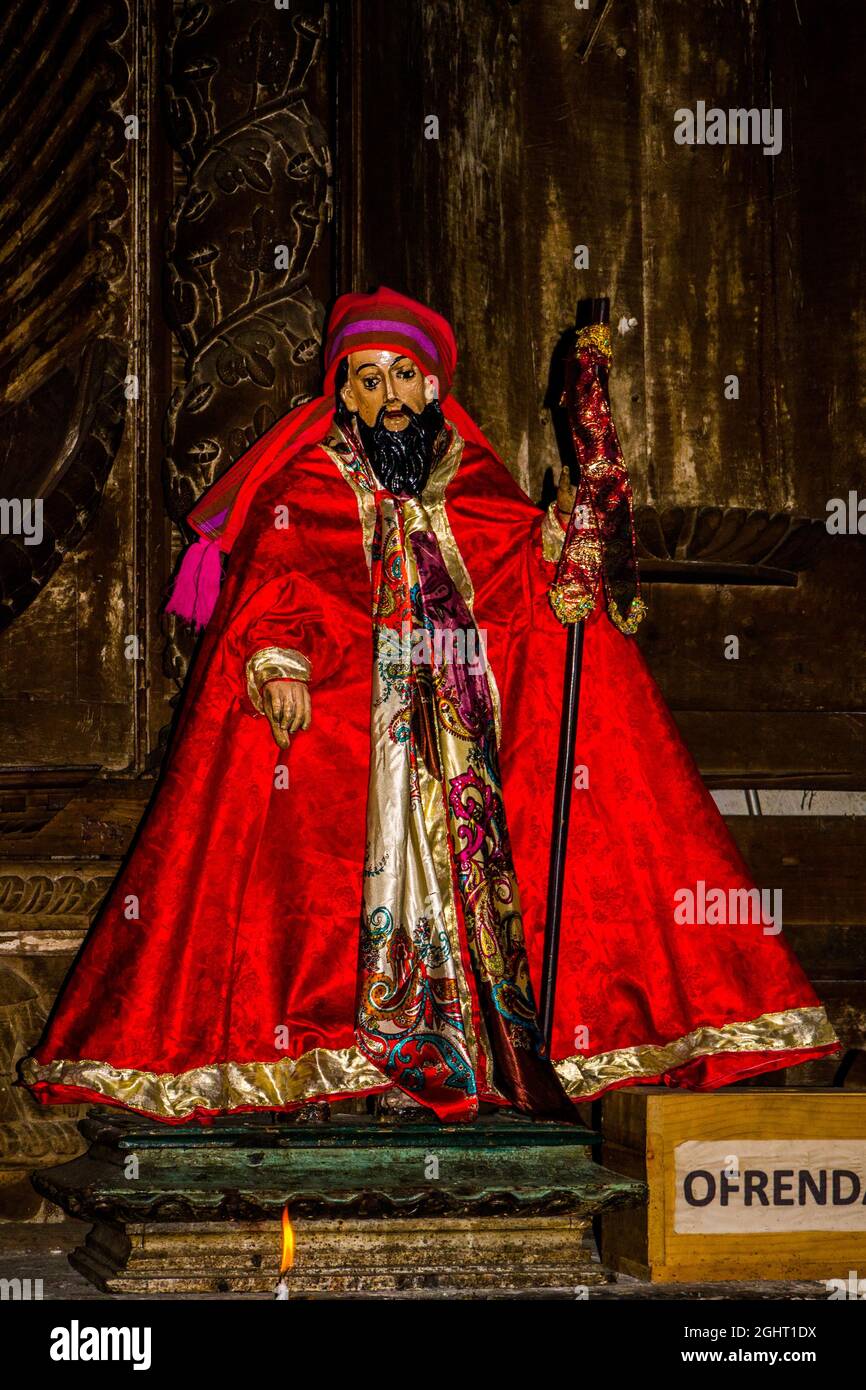 Wooden figures of the saints, dressed in traditional traditional ...