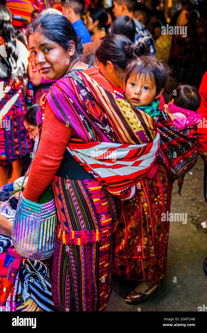 Carry child on back hi-res stock photography and images - Alamy