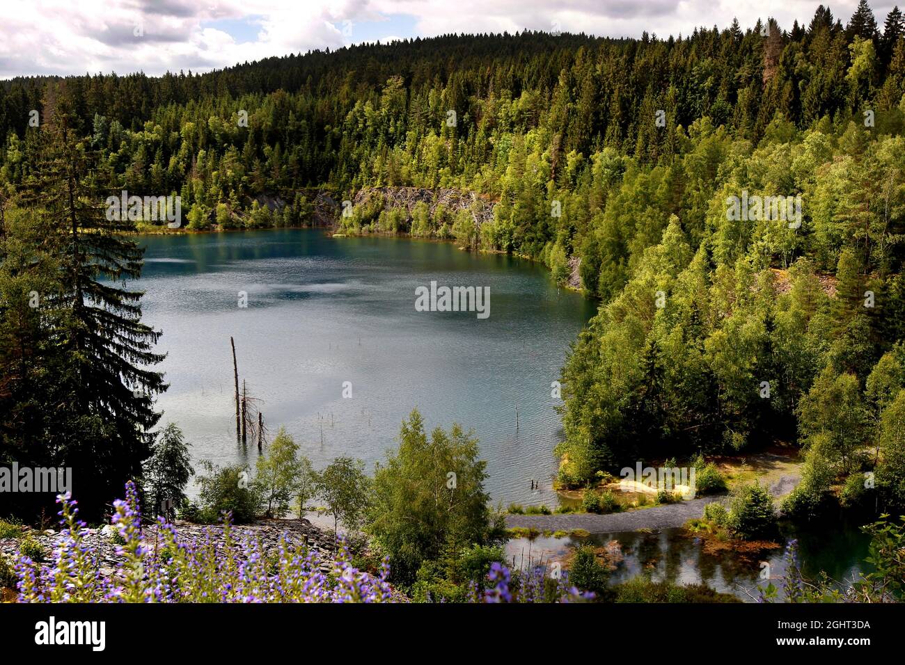 Flooded open-cast mine, historical open-cast slate mine, former roofing ...