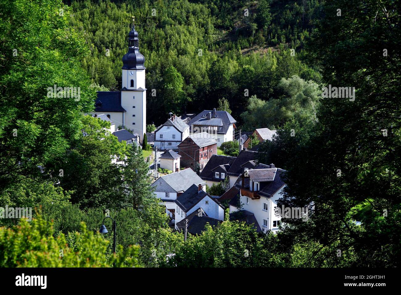 View of village with church, village in valley, village church with ...