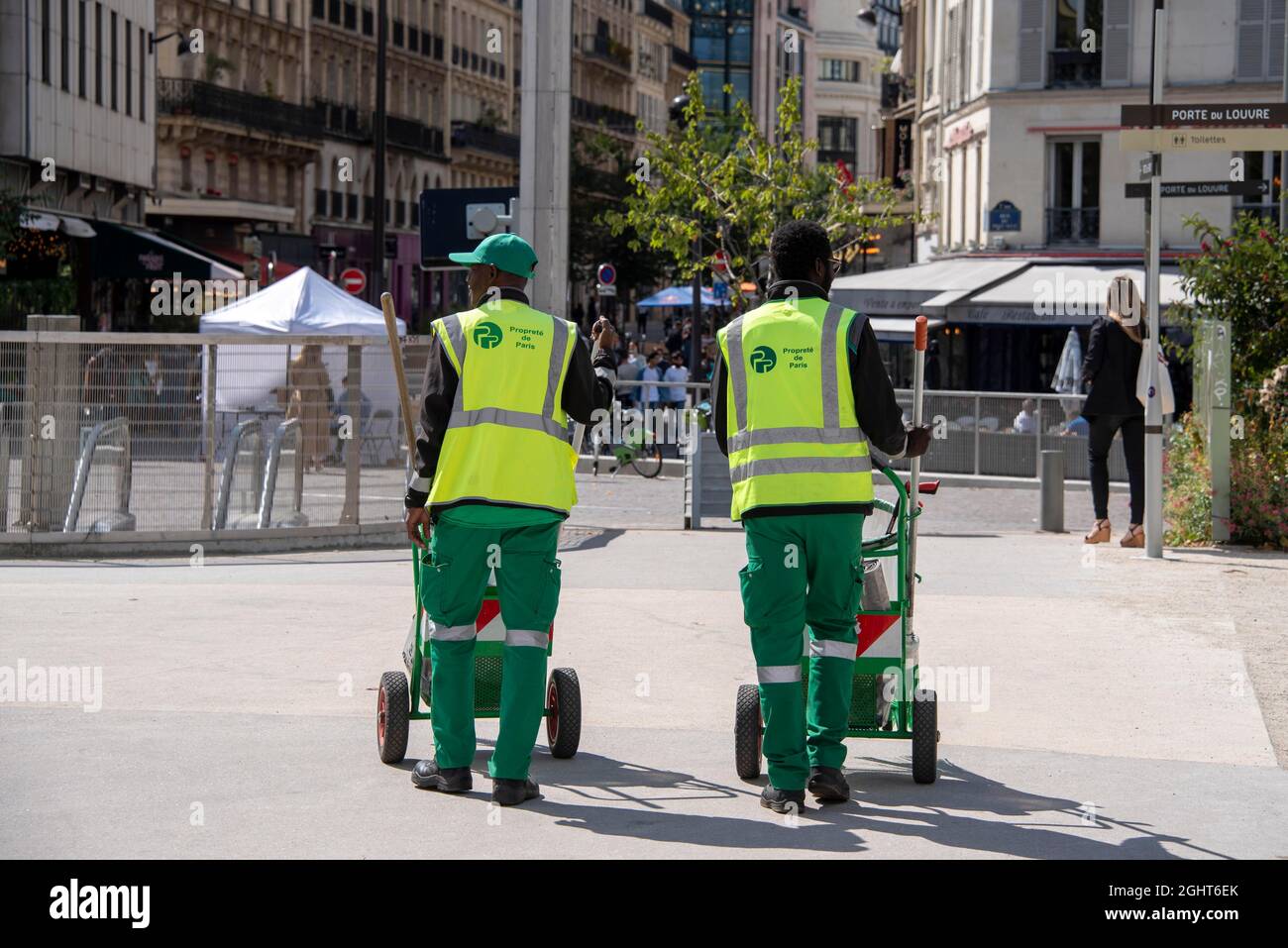 Two street cleaning workers, Paris, France Stock Photo - Alamy