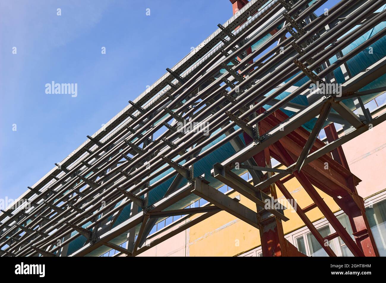 Cable route on steel and reinforced concrete supports. Rows of parallel ...