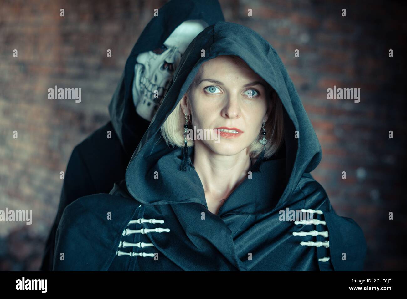 the girl and death in the cloak Stock Photo - Alamy