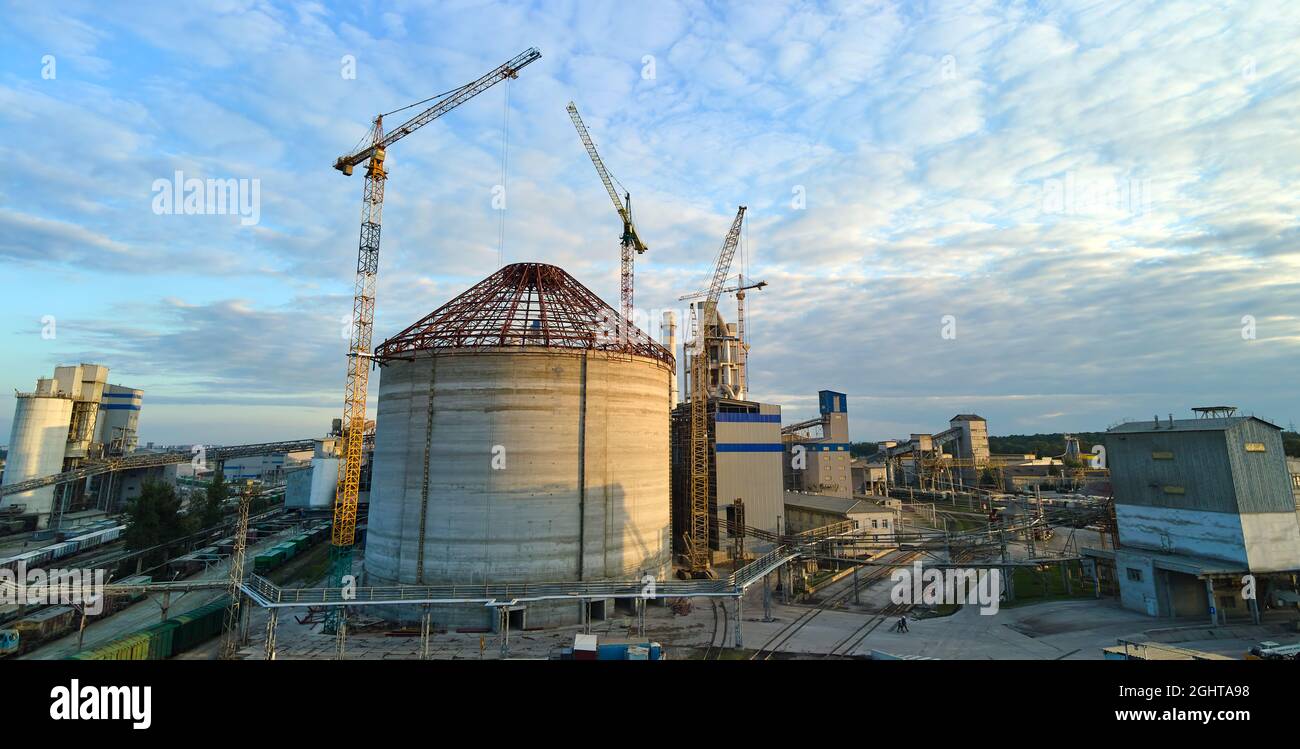Aerial view of cement factory under construction with high concrete ...