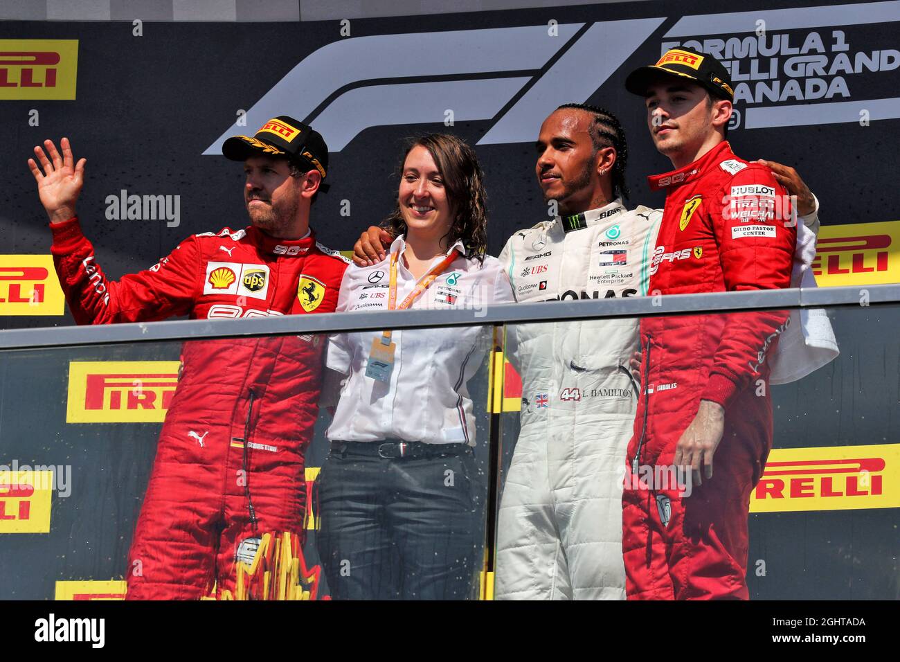 The podium (L to R): Sebastian Vettel (GER) Ferrari second; Marga Torres Diez, Mercedes AMG F1 ...