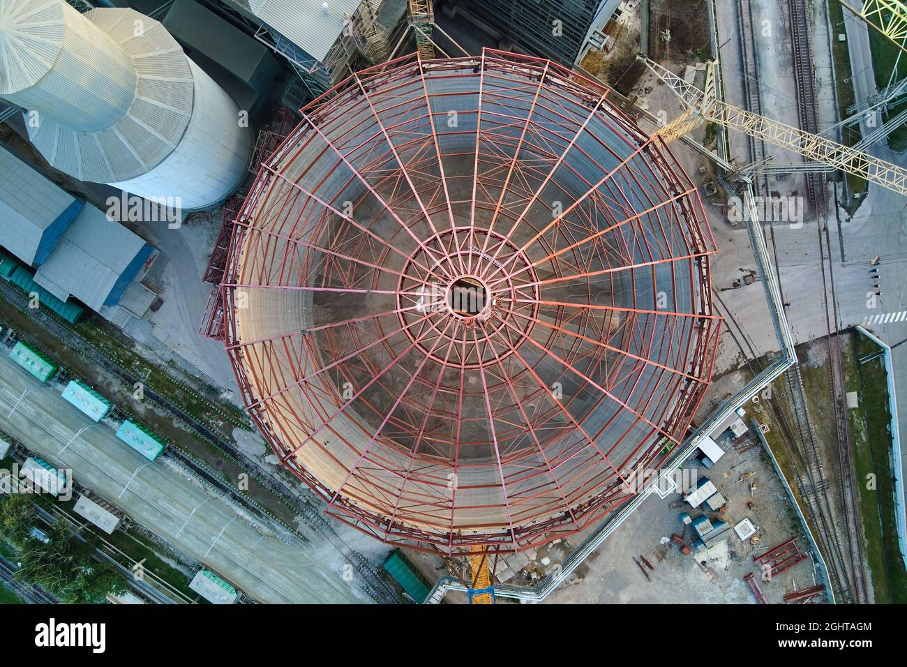 Aerial view of cement factory under construction with high concrete ...