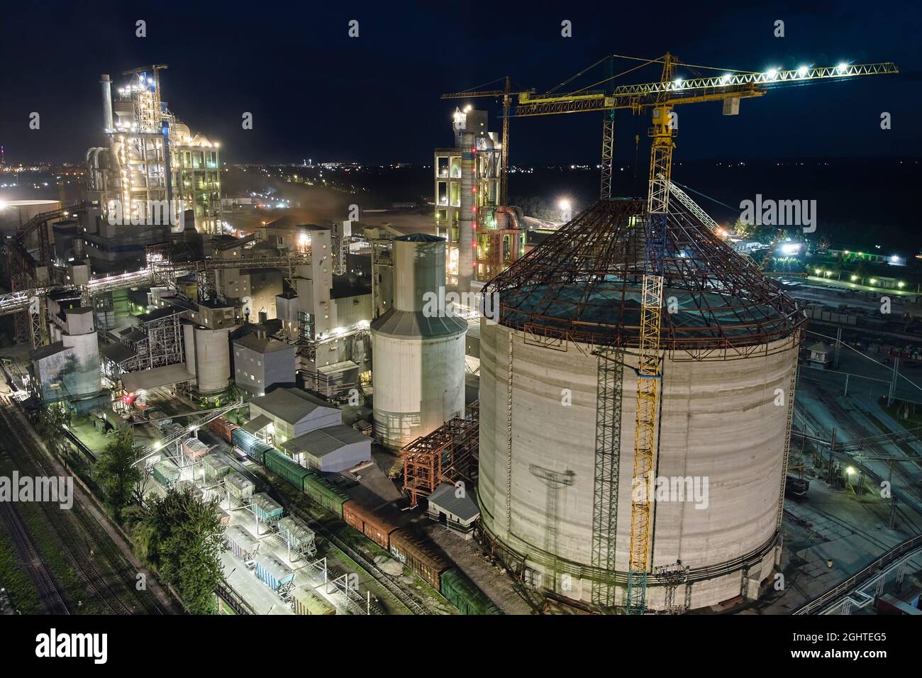 Aerial view of cement factory with high concrete plant structure and ...