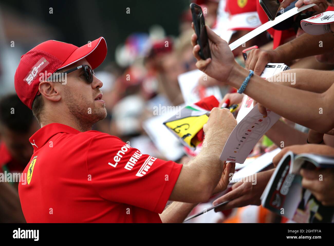 Sebastian Vettel (GER) Ferrari signs autographs for the fans. 29.08. ...