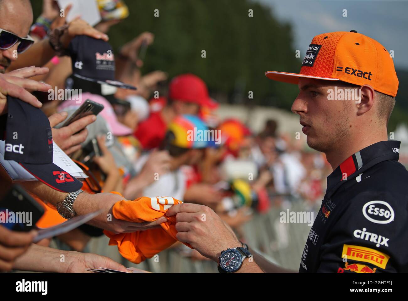 Max Verstappen (NLD) Red Bull Racing signs autographs for the fans. 29. ...