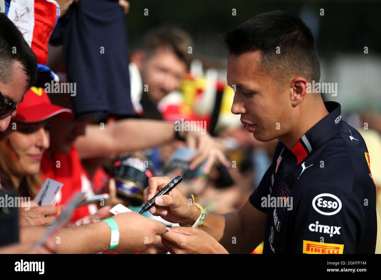 Alexander Albon (THA) Red Bull Racing signs autographs for the fans. 29 ...