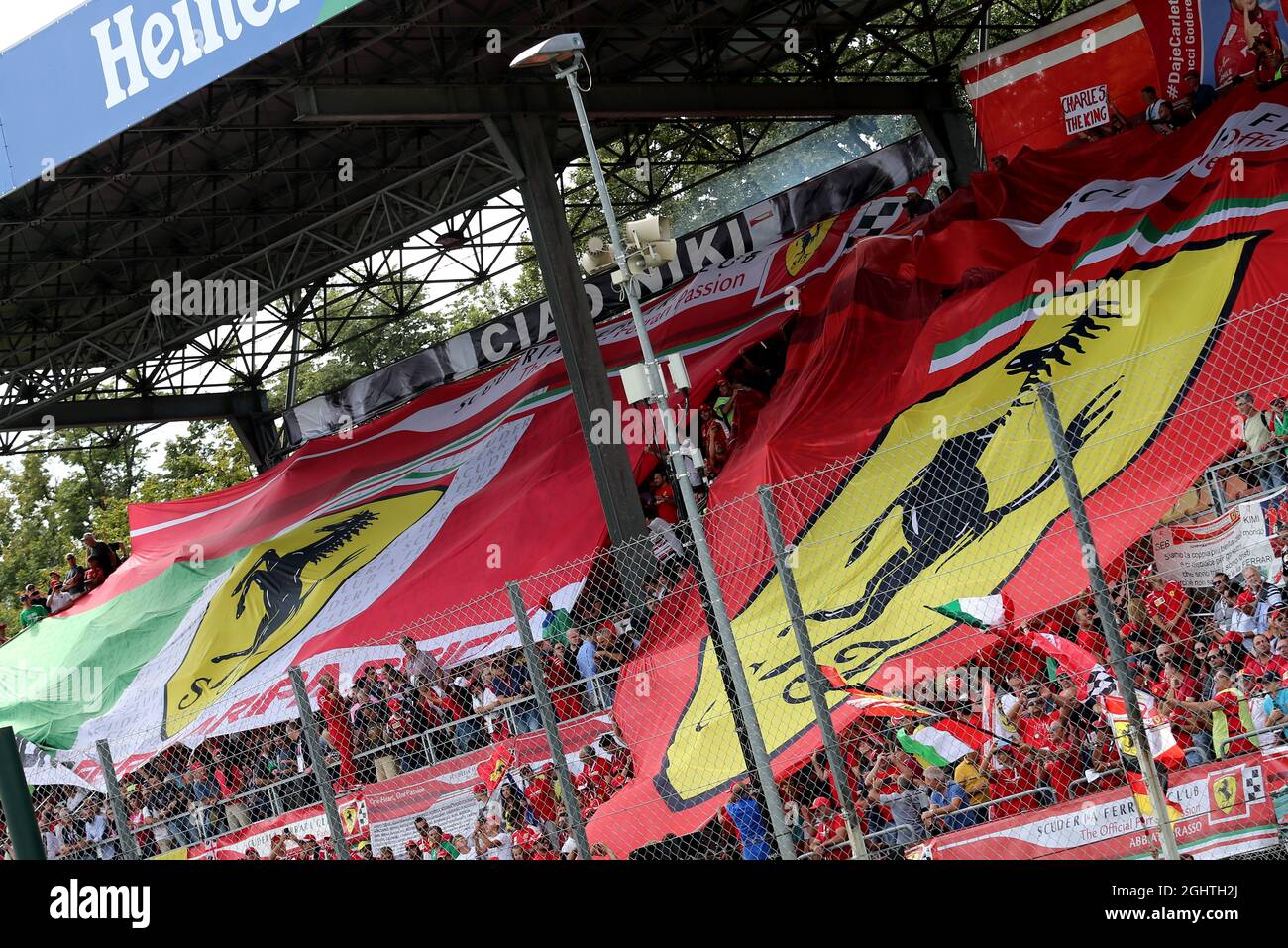Circuit atmosphere - large Ferrari flag with fans in the grandstand. 07 ...