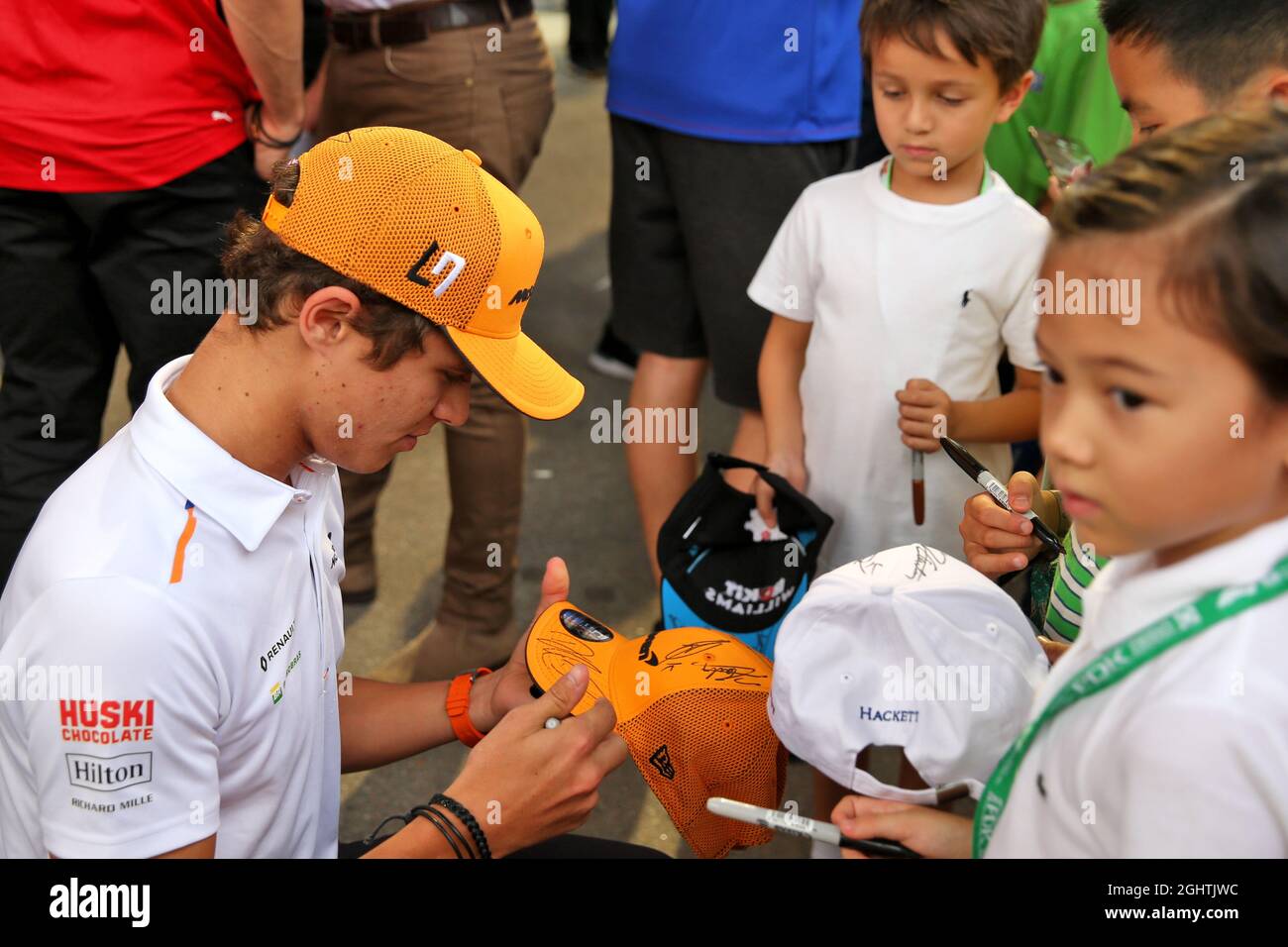 Lando Norris (GBR) McLaren with grid kids on the drivers parade. 22.09. ...