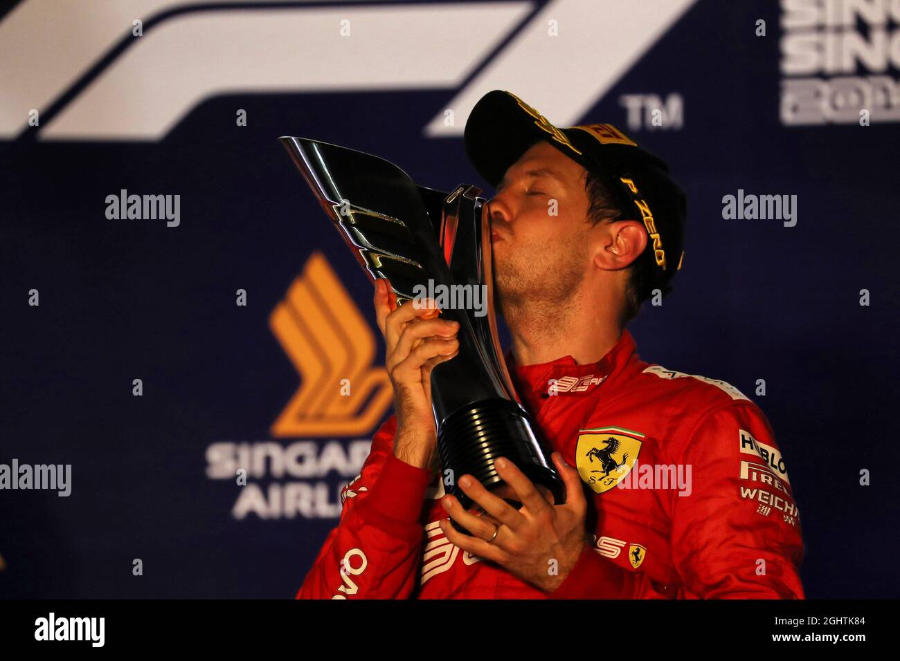 Race winner Sebastian Vettel (GER) Ferrari celebrates on the podium. 22 ...