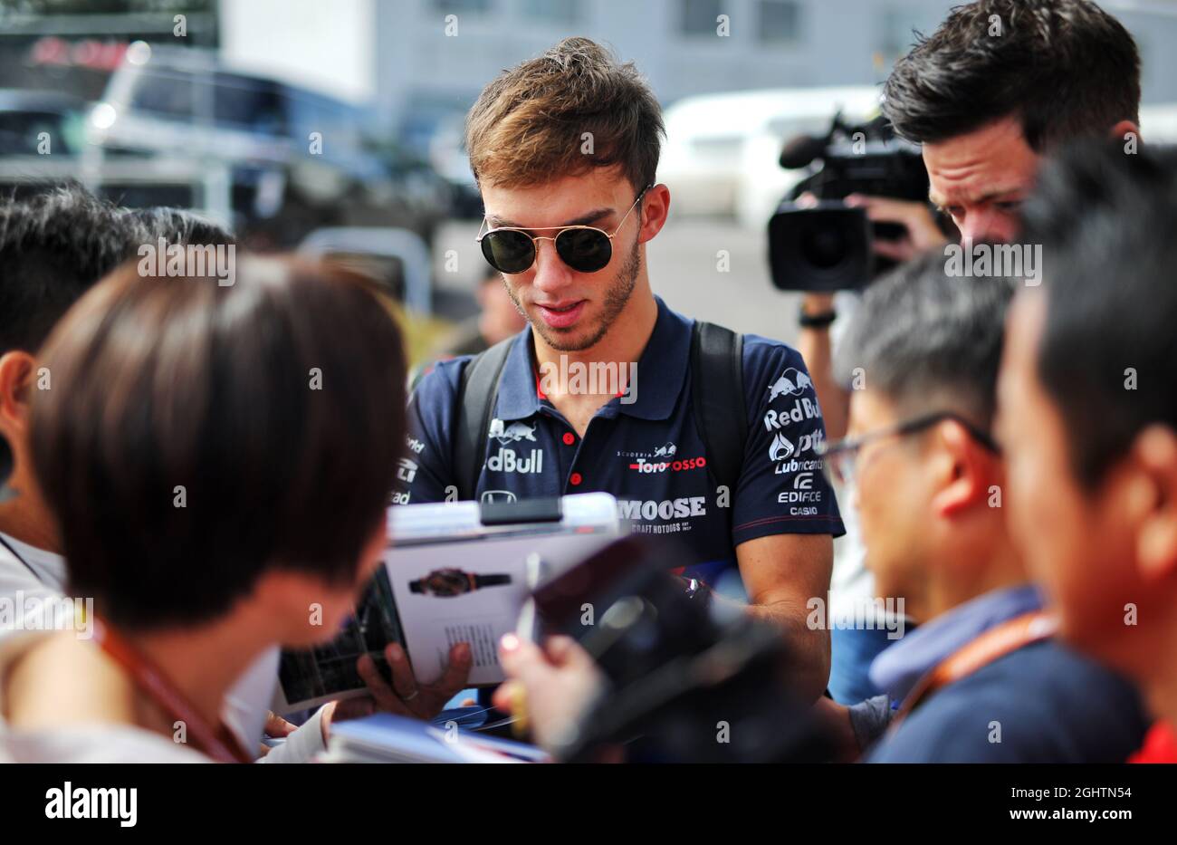 Pierre Gasly (FRA) Scuderia Toro Rosso signs autographs for the fans ...