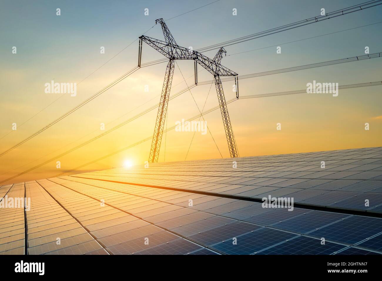High voltage pylons with electric power lines transfering electricity ...