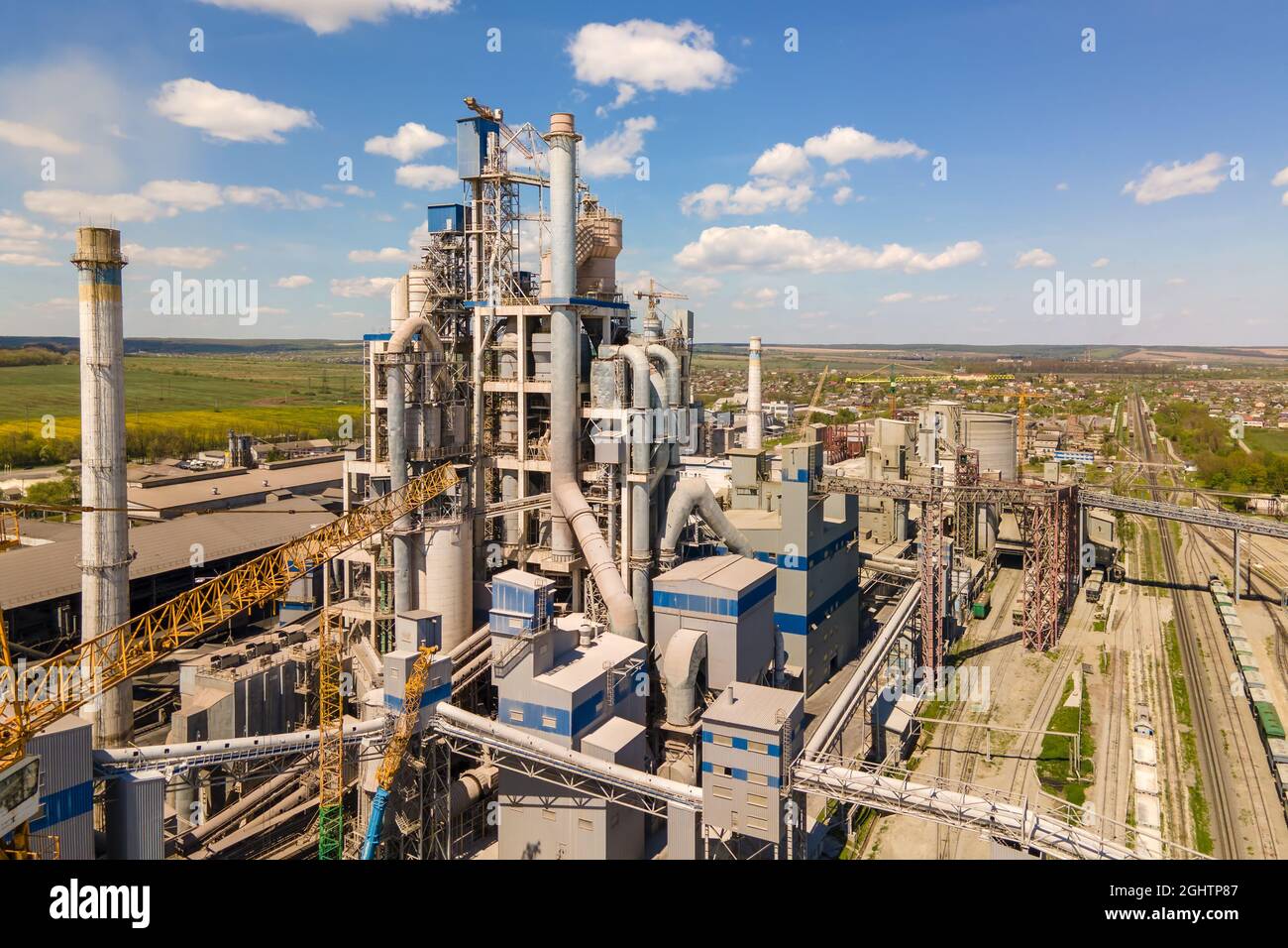 Aerial view of cement plant with high concrete factory structure and ...
