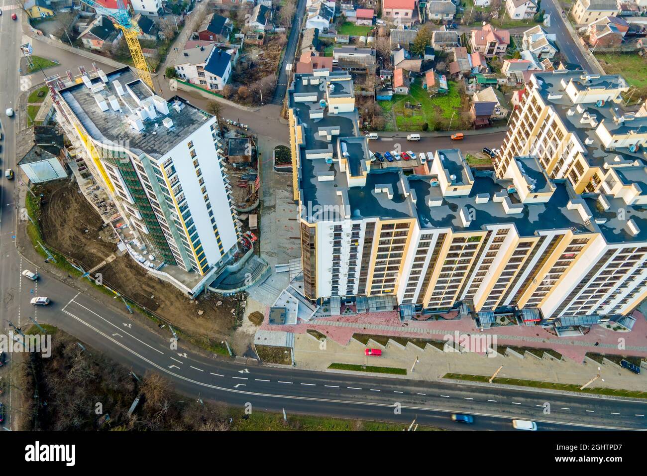 High rise apartment buildings and streets with traffic in city ...