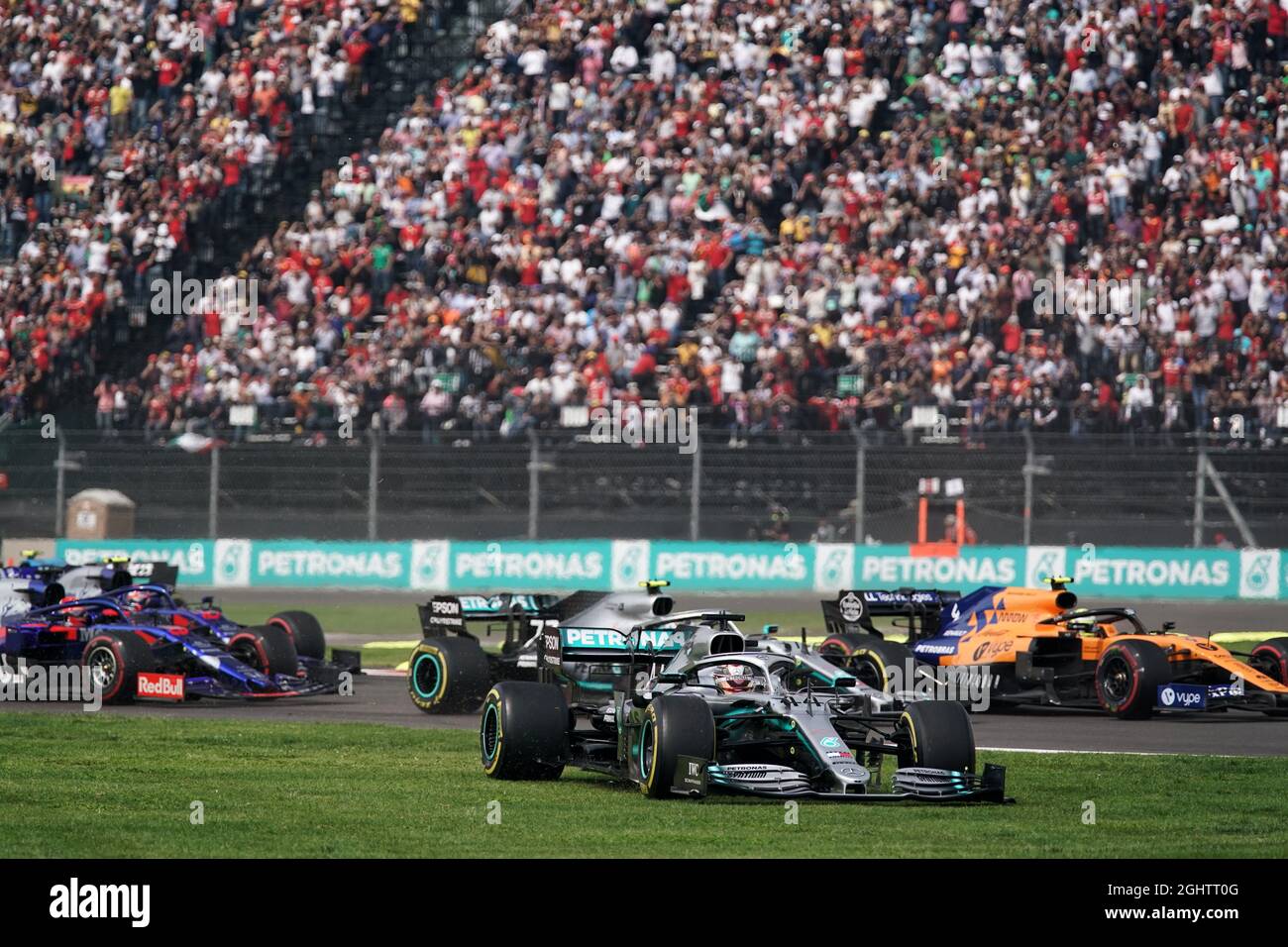 Lewis Hamilton (GBR) Mercedes AMG F1 W10 runs wide at the start of the ...