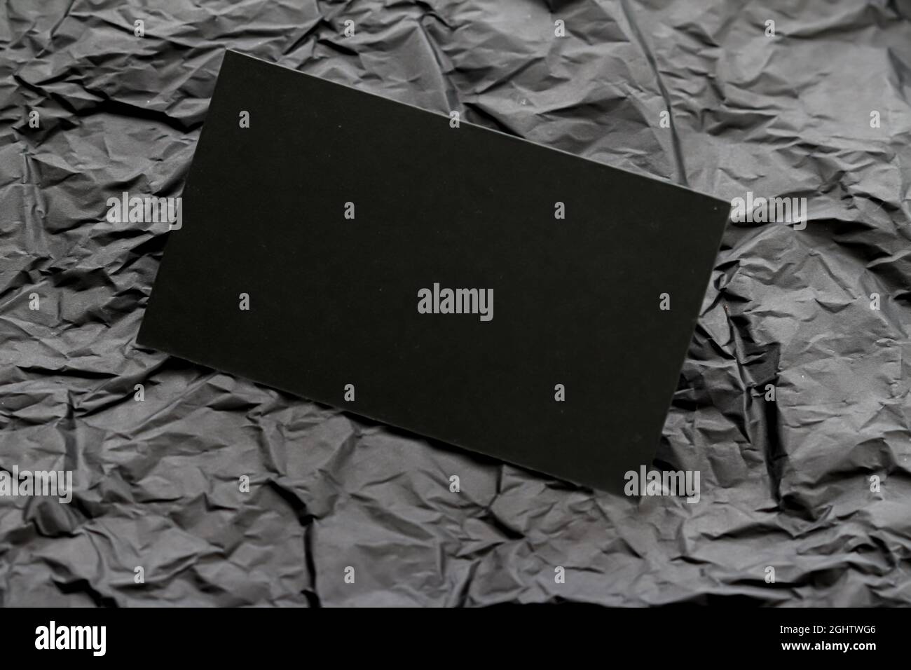 Blank black card for mockup on gray paper background Stock Photo - Alamy