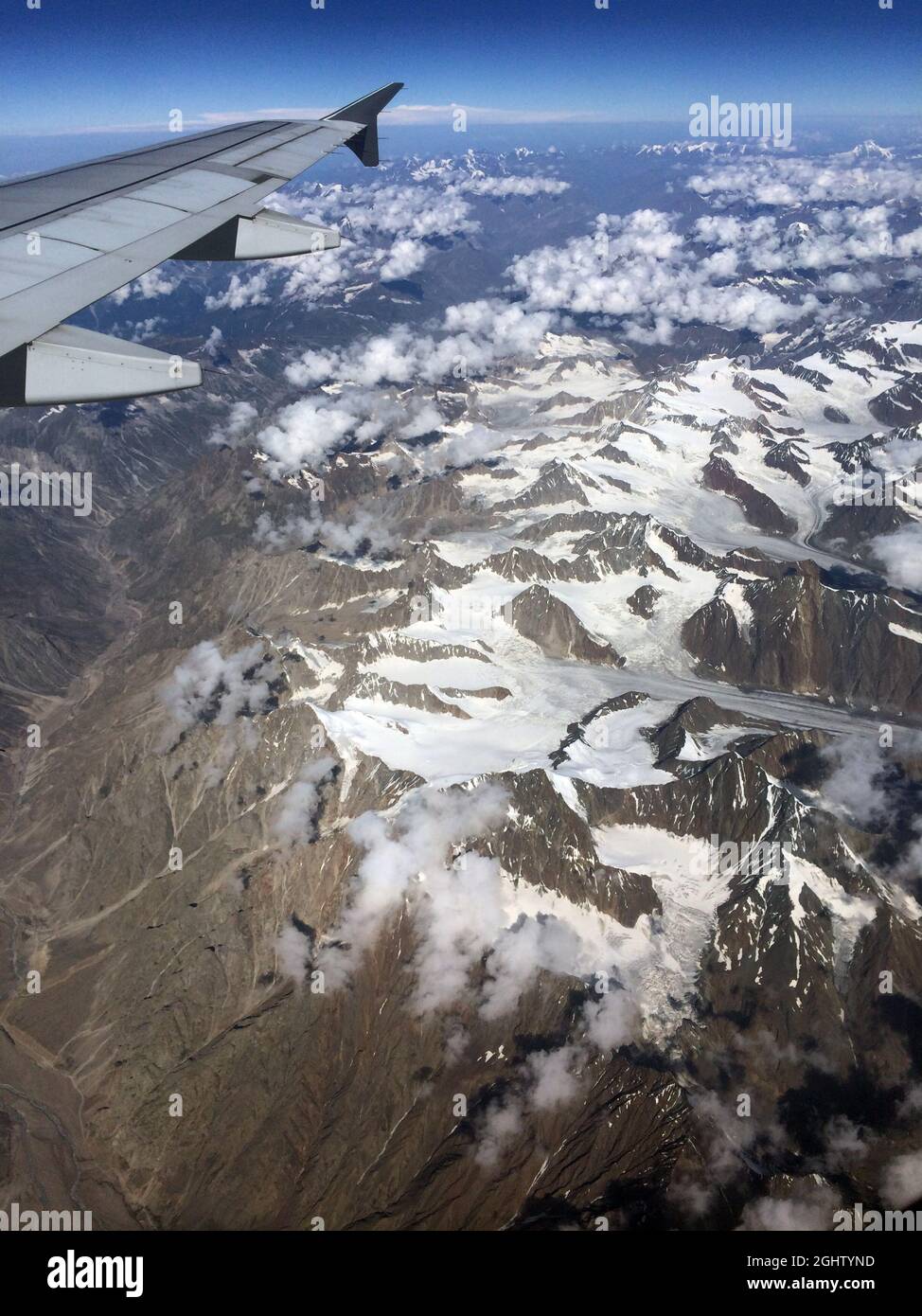 Aircraft wing flying over Himalayas, India Stock Photo - Alamy