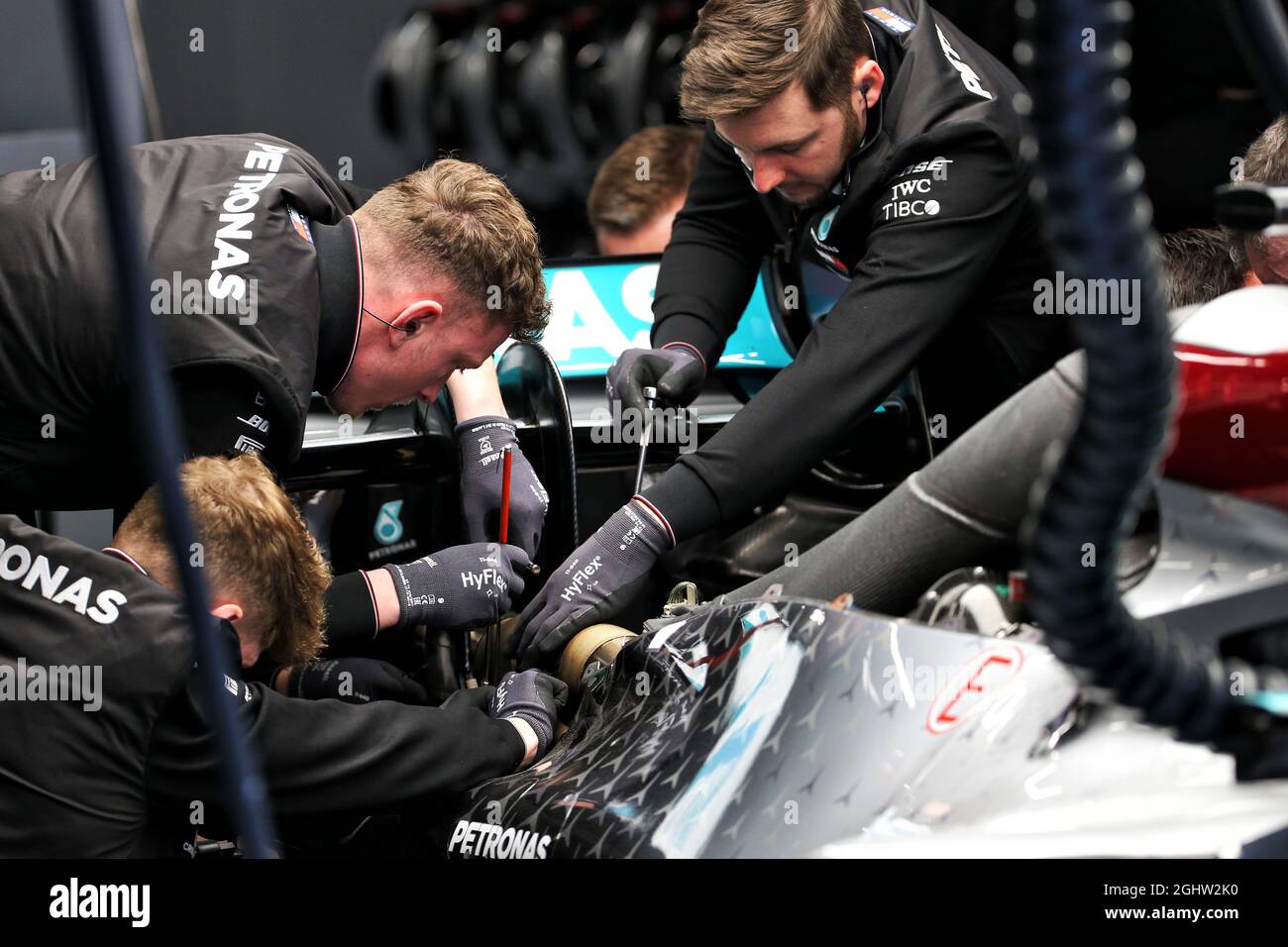 Mercedes AMG F1 mechanics work on the Mercedes AMG F1 W11. 26.02.2020 ...
