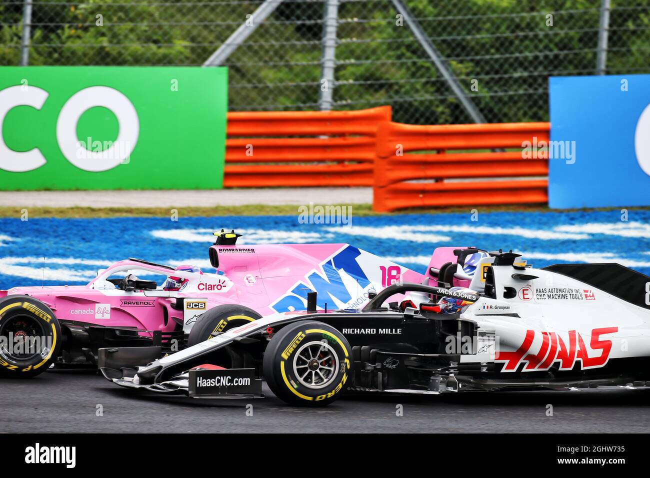 Lance Stroll (CDN) Racing Point F1 Team RP20 and Romain Grosjean (FRA ...