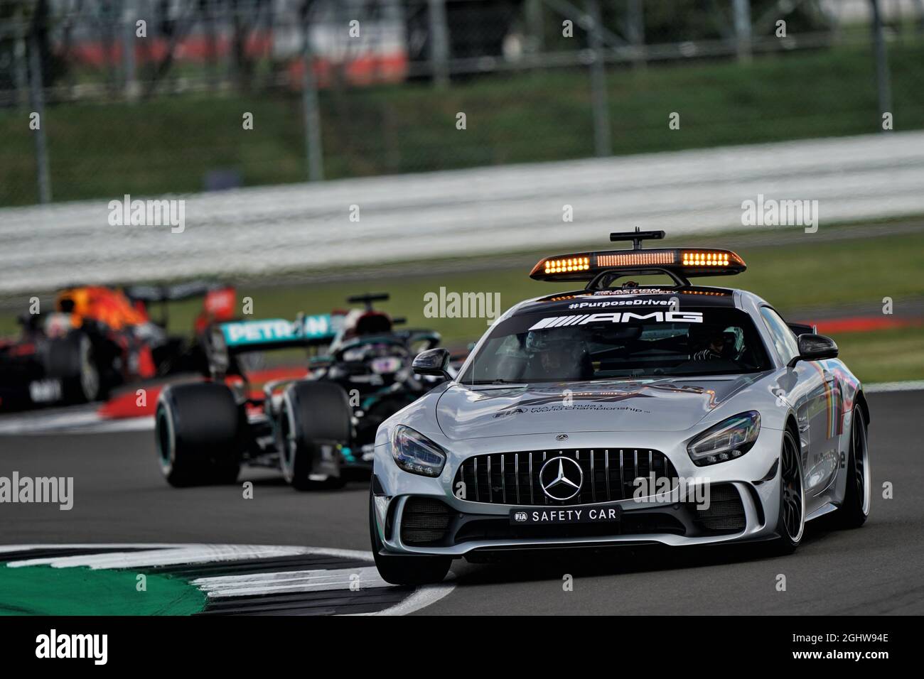 Lewis Hamilton (GBR) Mercedes AMG F1 W11 leads behind the FIA Safety ...