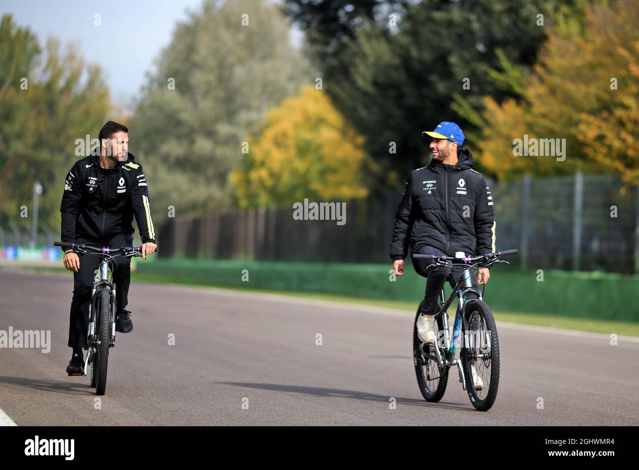 Daniel Ricciardo (AUS) Renault F1 Team rides the circuit with Michael ...
