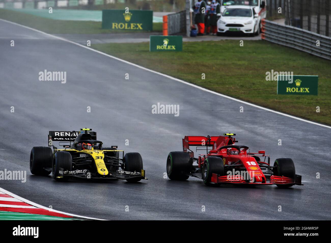 Alexander Albon (THA) Red Bull Racing RB16 and Charles Leclerc (MON ...