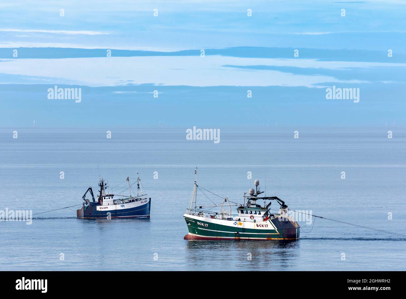 TRAWLERS WITH NETS FISHING FOR SQUID OFF THE MORAY COAST SCOTLAND Stock ...