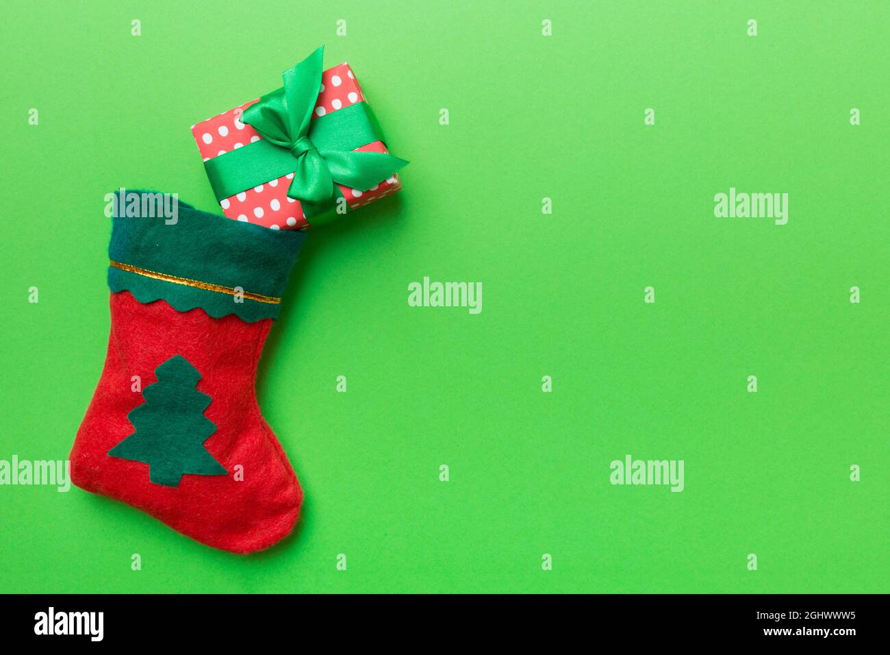 santa red sock top view on the color background with empty space ...