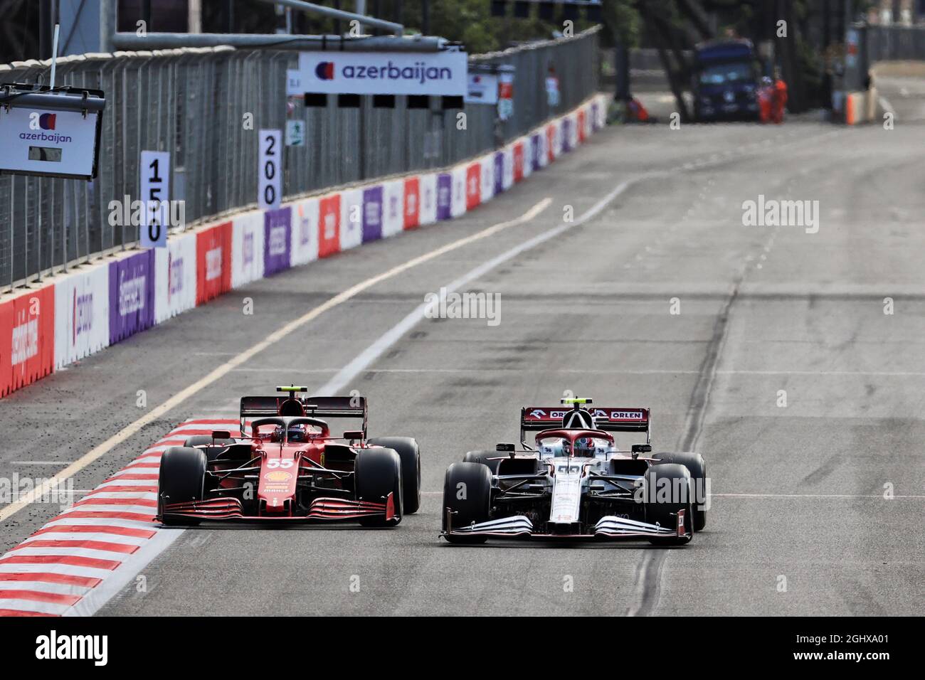 Carlos Sainz Jr (ESP) Ferrari SF-21 and Antonio Giovinazzi (ITA) Alfa ...