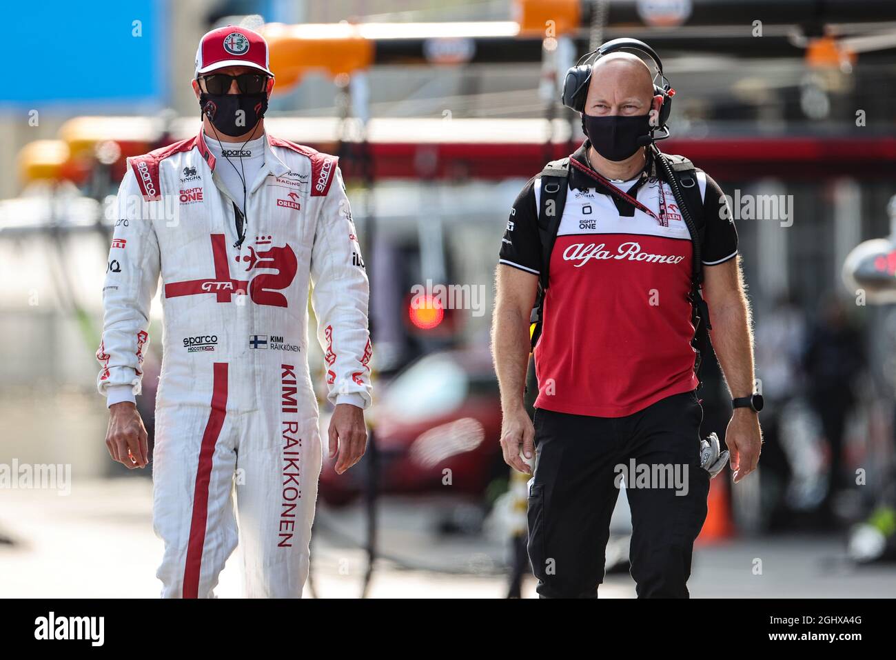 Kimi Raikkonen (FIN) Alfa Romeo Racing with Mark Arnall (GBR) Personal ...