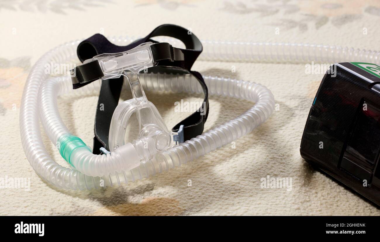 Assisted breathing mask on bed in elderly residence room Stock Photo ...