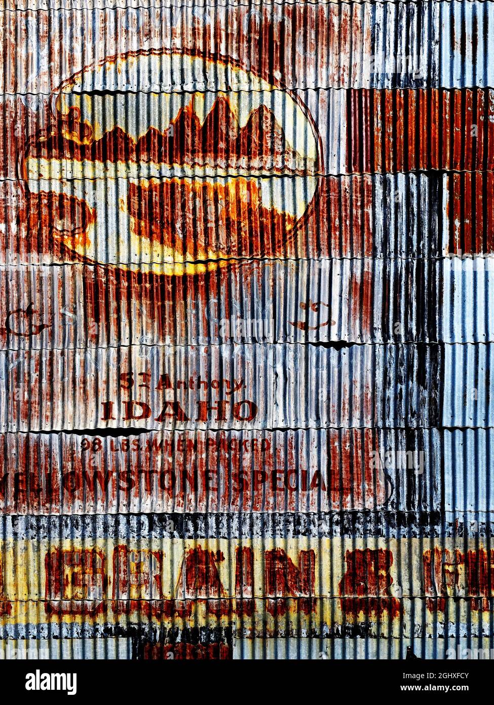 Old signs on wall of steel building of grain silo Stock Photo - Alamy