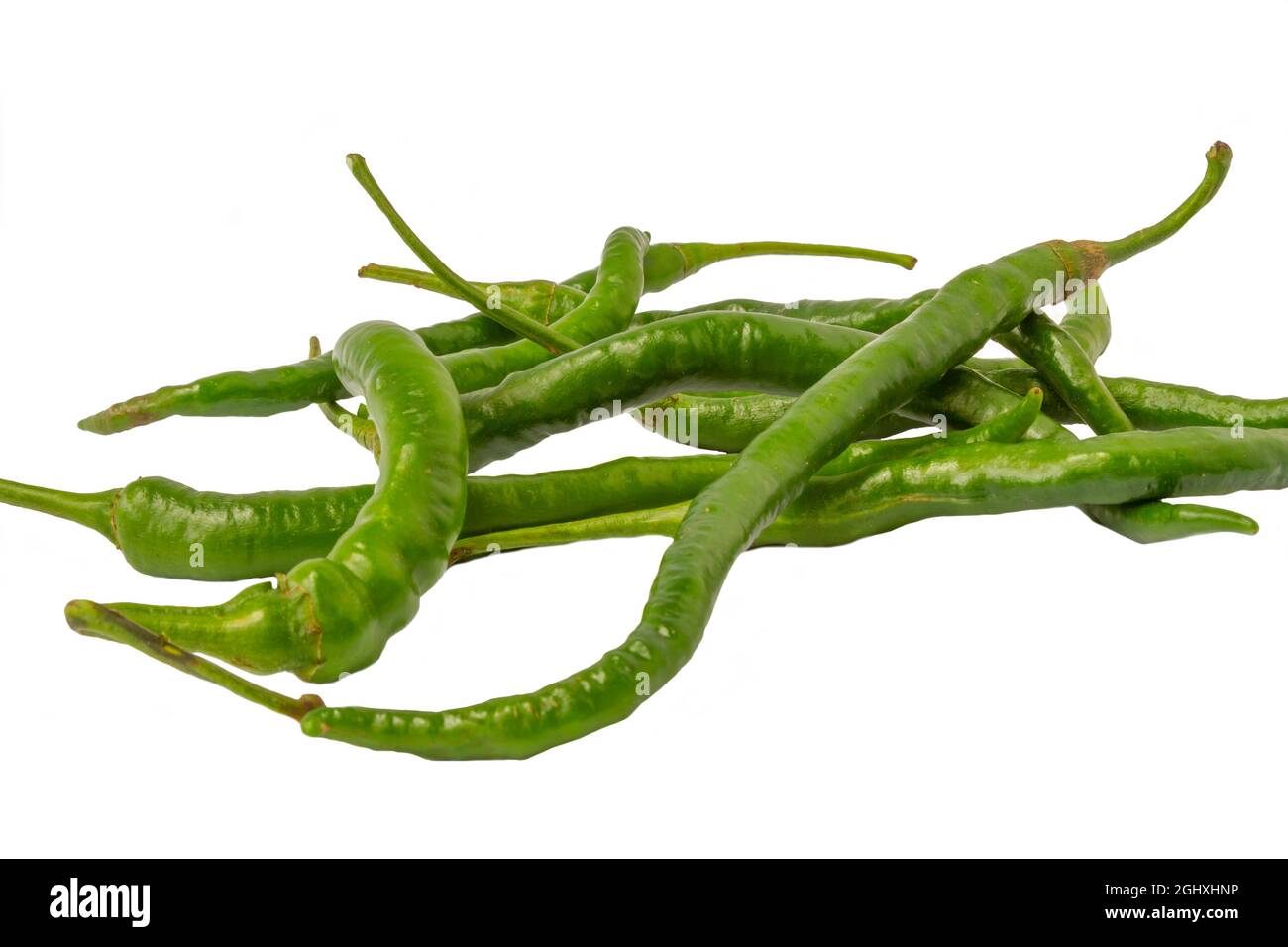 Isolated vegetable chili with a clipping path, green curly red chili ...
