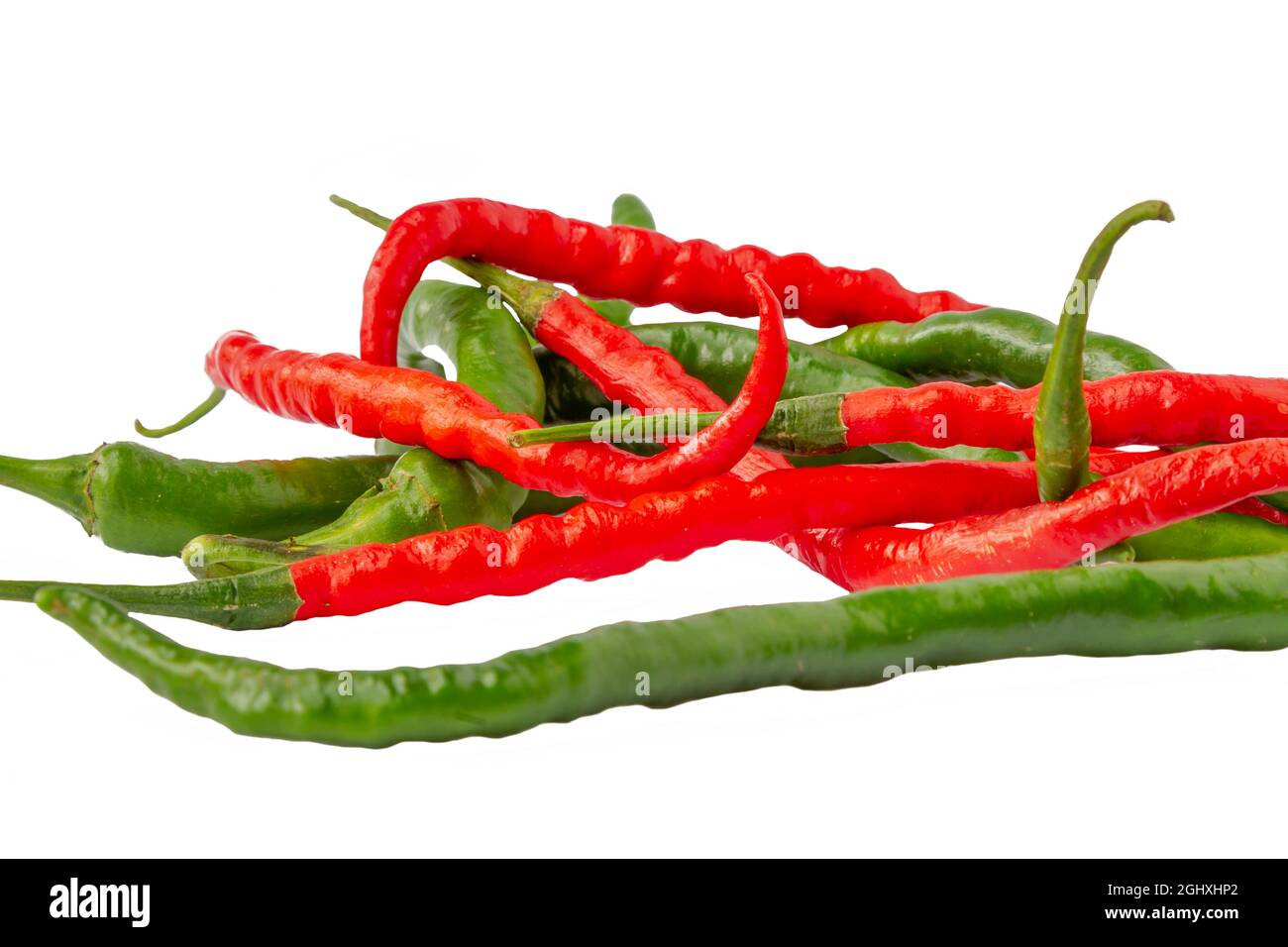 Isolated vegetable chili with a clipping path, red and green curly red ...