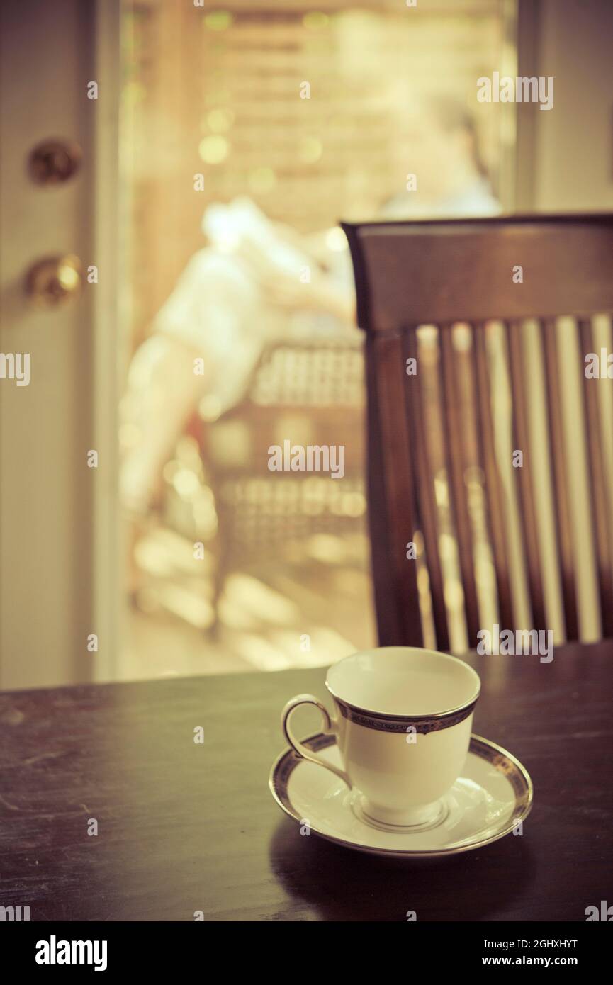 empty tea cup in an interior Stock Photo - Alamy