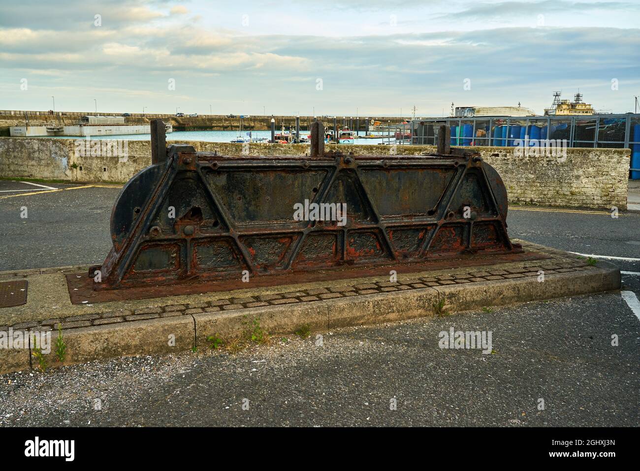 Old sluice gate mechanism on asphalt Stock Photo - Alamy