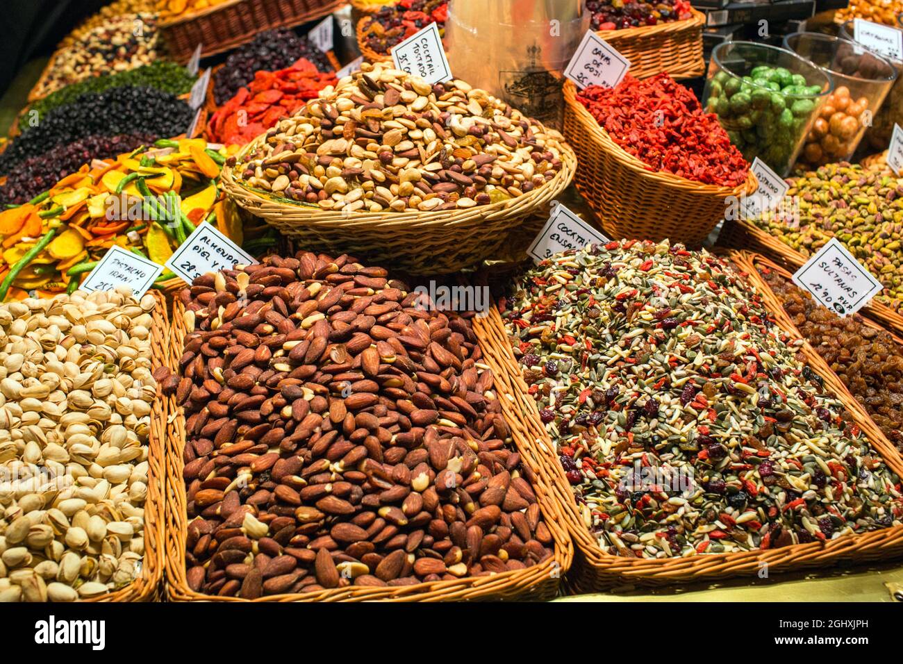 Barcelona, Spain. July 2018. Nuts and sweets on display in La Boqueria ...