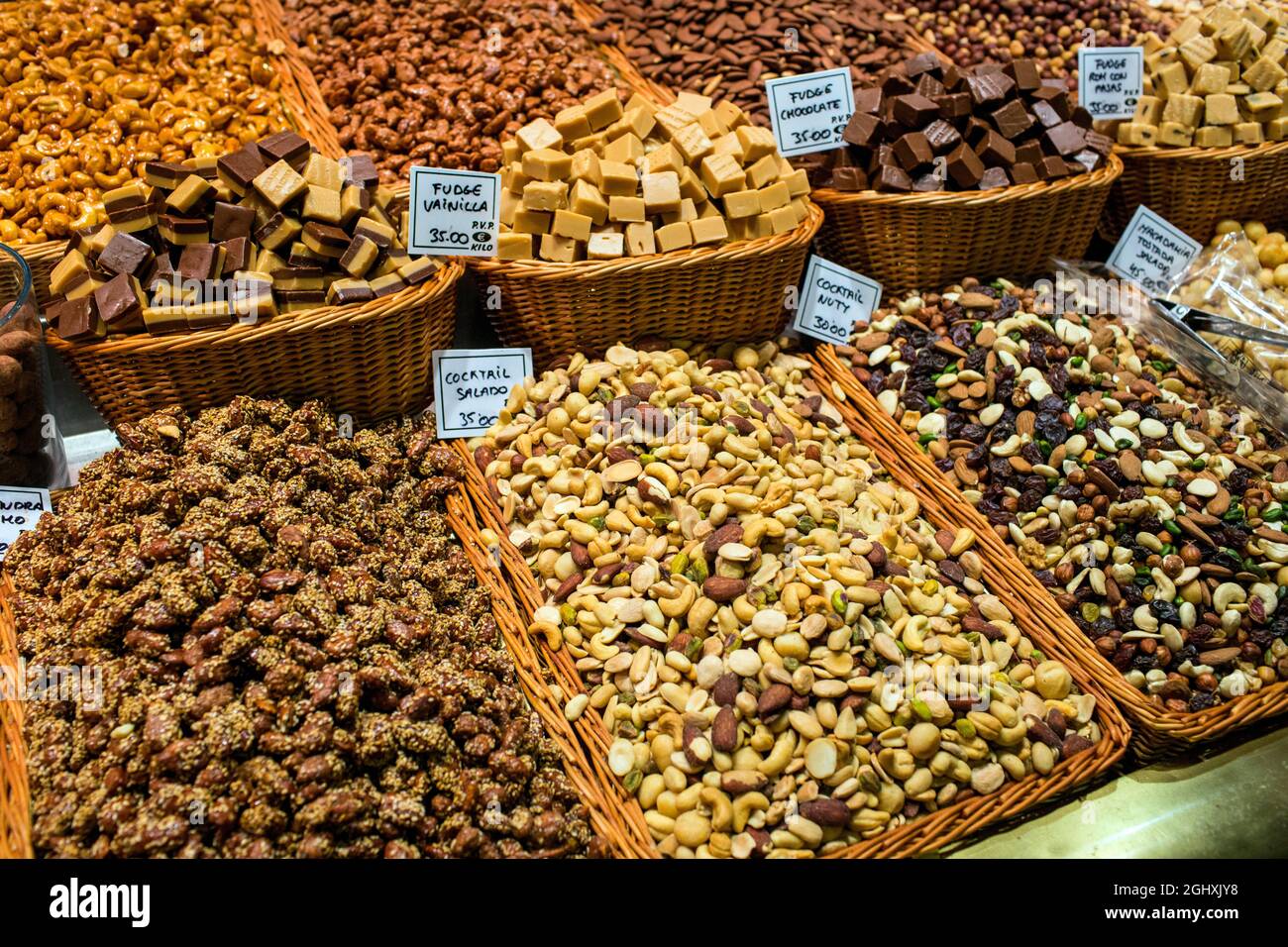 Barcelona, Spain. July 2018. Nuts and sweets on display in La Boqueria ...